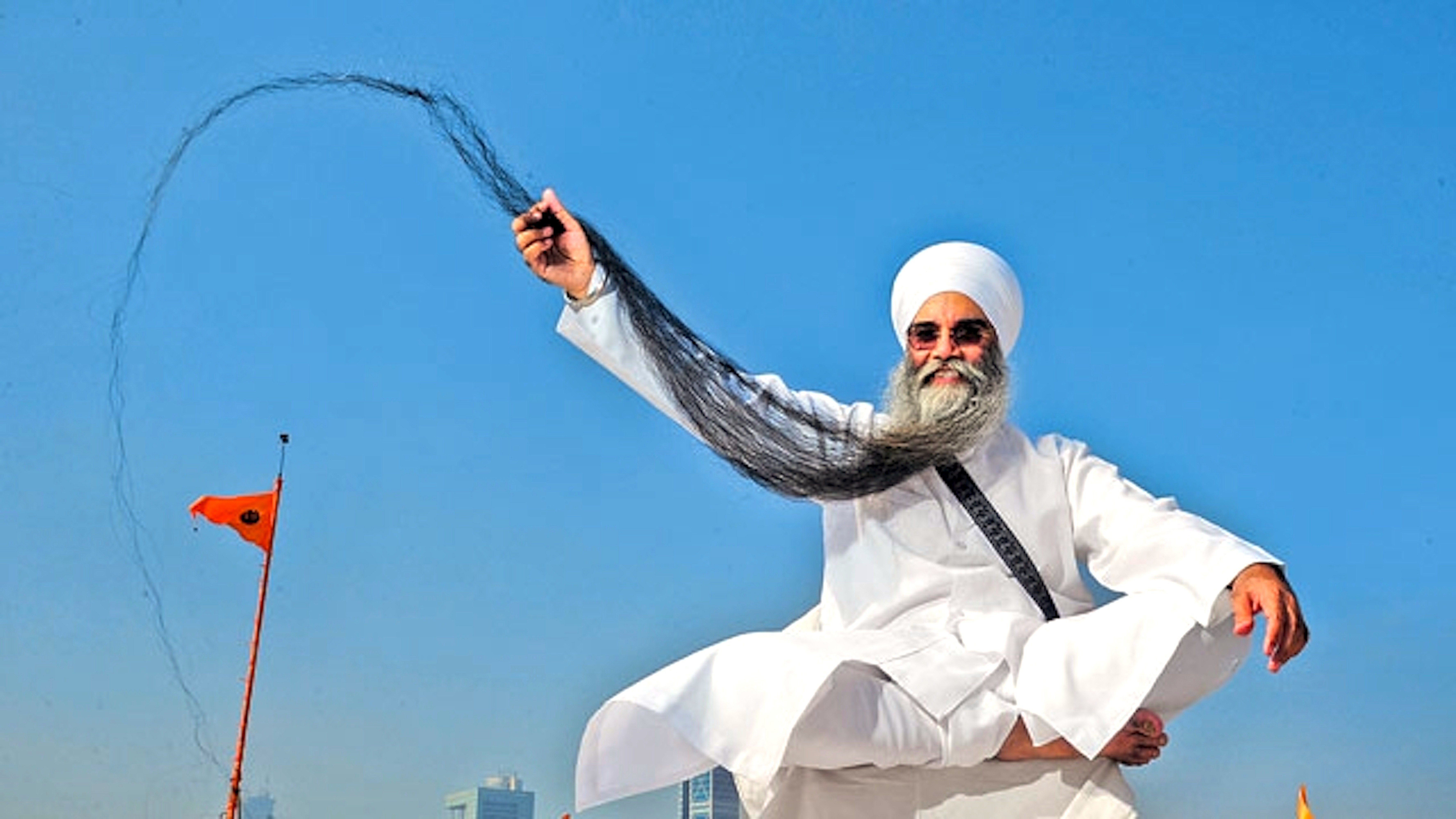 Guinness record holder for longest beard Guru Gobind Jayanti shows off ...